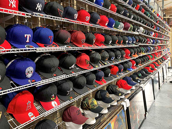 Baseball cap heaven! From Yankees to Angels, this display has more team spirit than a sports bar during playoff season.