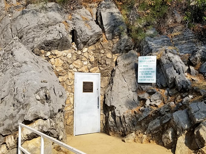 Not the doorway to Narnia, but close enough! This unassuming entrance conceals 250 million years of geological artistry waiting just beyond.