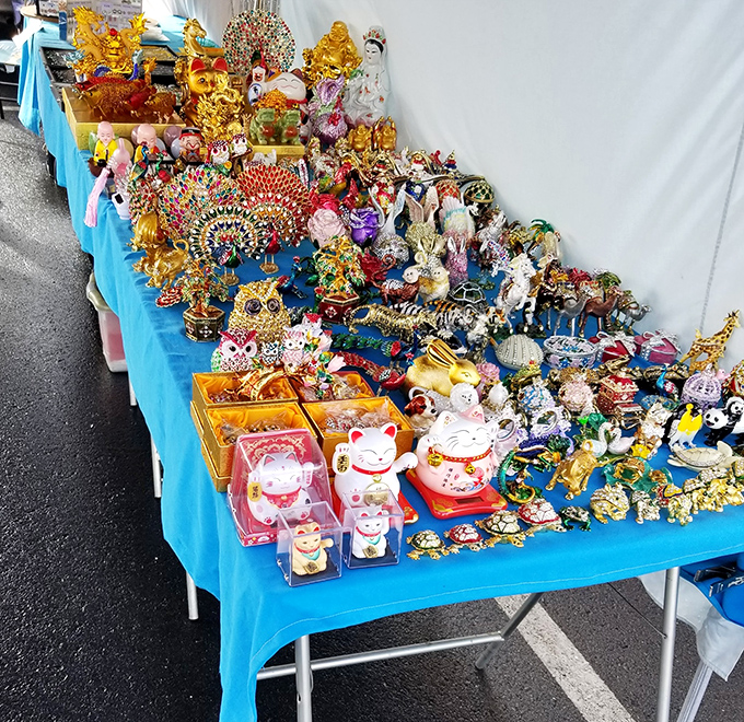Lucky cats wave hello while golden Buddhas promise prosperity. Like my grandmother always said: "Why wish for luck when you can buy it?"