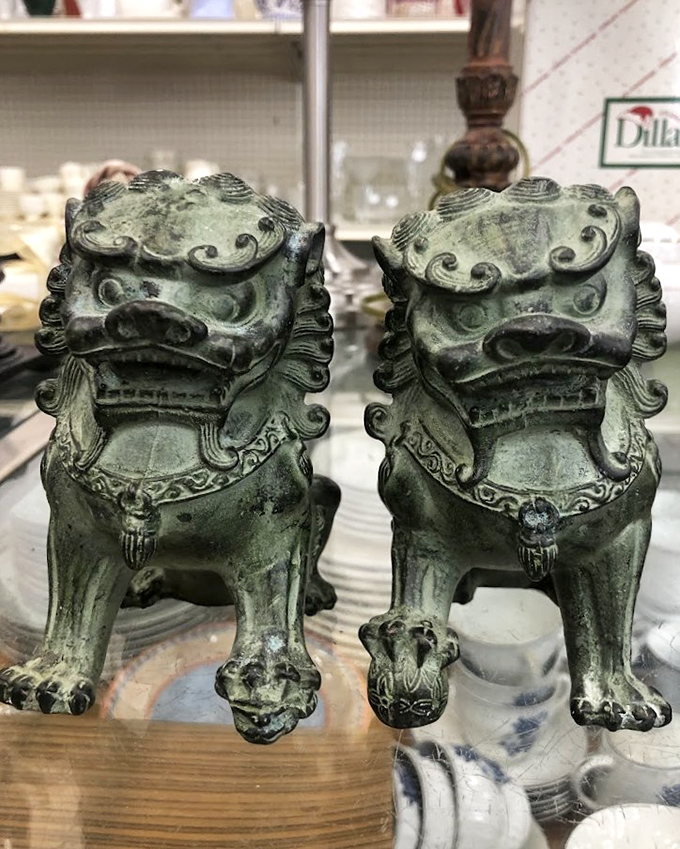 These jade-colored Foo Dogs aren't just decorative—they're guardians of good taste waiting to protect your mantelpiece from boring décor.