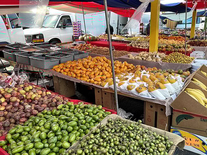 Nature's color palette on full display—these produce stands put supermarket offerings to shame with their vibrant, farm-fresh bounty.