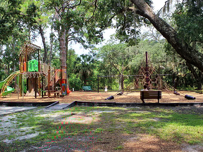 Childhood memories come alive at this shaded playground. Nature and play equipment coexist in perfect harmony—like peanut butter and jelly if they were designed by a landscape architect.