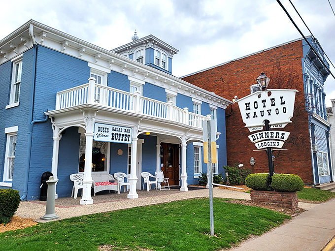Hotel Nauvoo's striking blue facade isn't just eye-catching—it's practically begging you to come in for their legendary buffet that would make your grandmother proud.