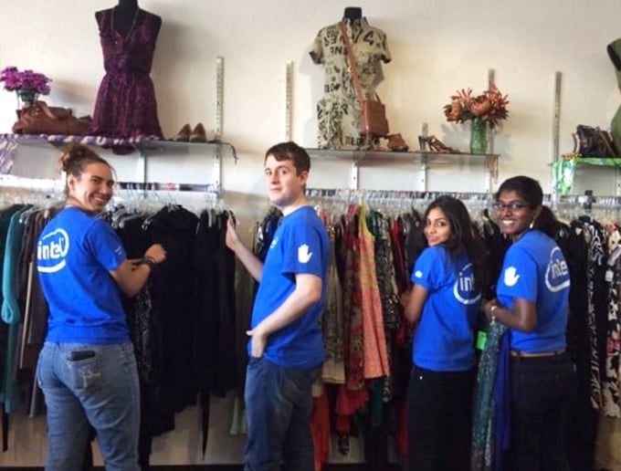 Volunteers organize racks with military precision, proving that secondhand shopping doesn't mean second-rate organization.