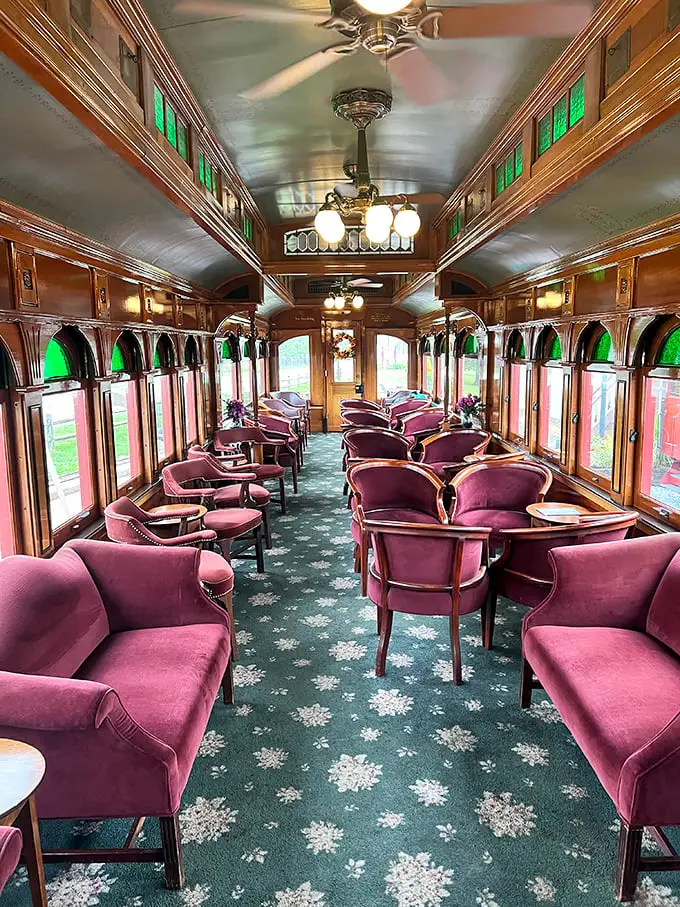 First-class luxury from another era. Those plush velvet chairs aren't just seats – they're time machines with armrests and impeccable upholstery.