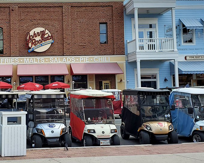 Johnny Rockets stands ready to serve, while the real show is the colorful parade of personalized golf carts outside—retirement's answer to custom hot rods.