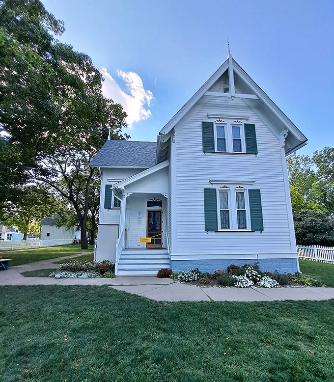 The Victorian keeper's house looks like something from a Hallmark movie, complete with those charming green shutters.