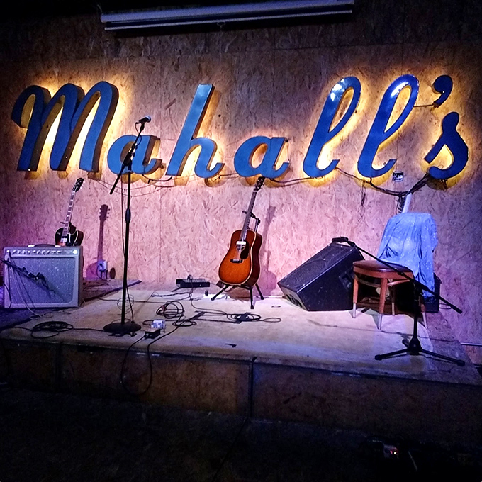 When the pins stop falling, the music starts playing. Mahall's iconic blue sign illuminates performers who transform this bowling alley into one of Ohio's most unique concert venues.