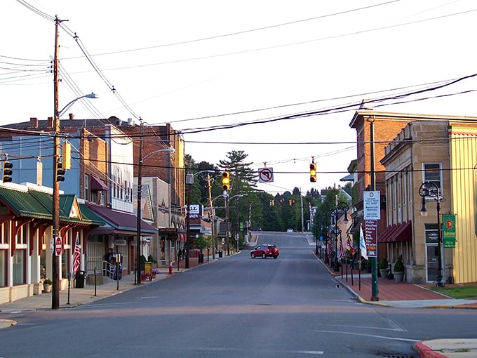Main Street at dusk – when the traffic light changes, all three cars in town know about it.
