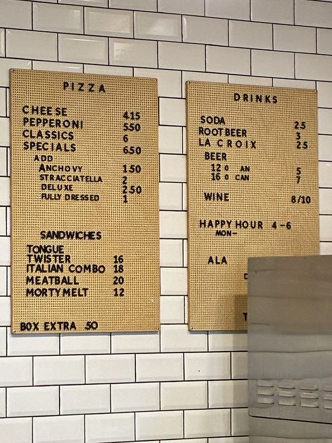 A menu that doesn't need a table of contents—just straightforward pizza perfection. Notice the "Morty Melt" sandwich? That alone deserves a pilgrimage. 