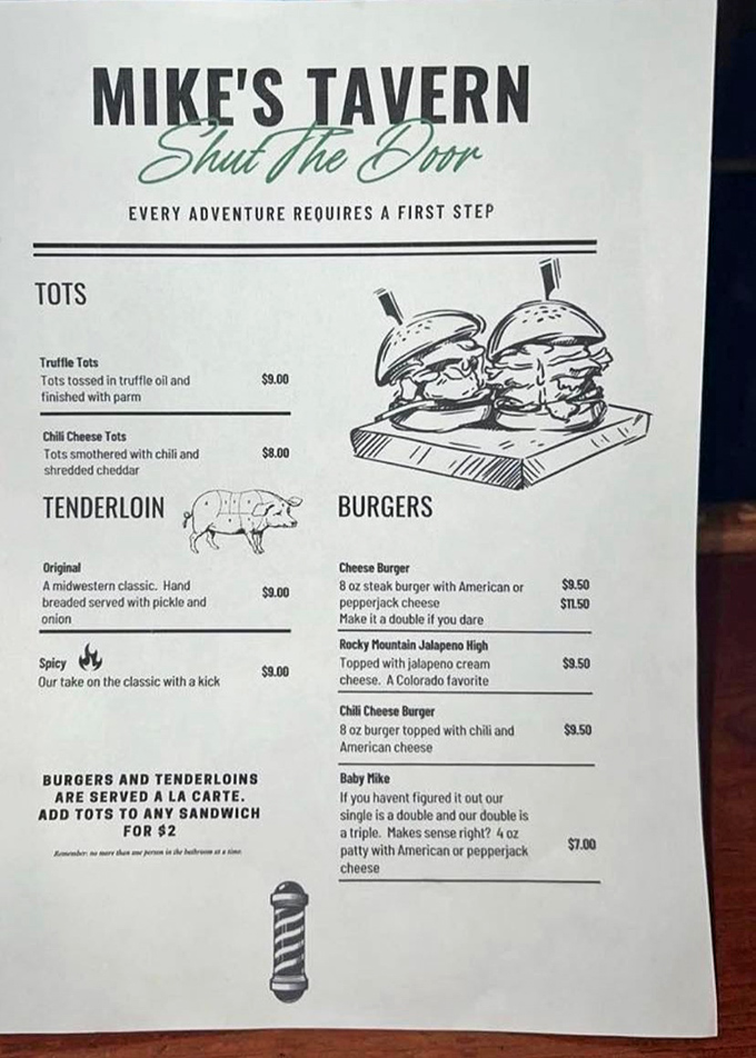 The menu's motto—"Shut The Door"—isn't just practical winter advice; it's an invitation to leave pretentious dining experiences outside and embrace honest Midwestern comfort.