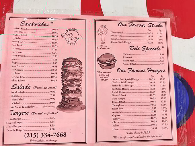 The pink menu reads like a love letter to Philadelphia sandwich culture. Notice they offer "light sandwiches for light eaters"—a rare courtesy in a city that celebrates excess.