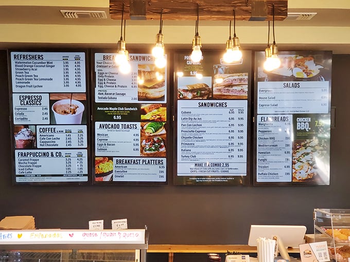 The menu board—where life-altering decisions are made daily. Pro tip: everything looks good because everything IS good.