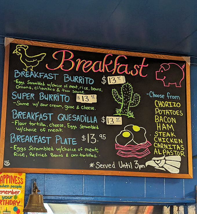 The breakfast menu board, with its colorful chalk lettering and cute illustrations, promises morning salvation in the form of chorizo, eggs, and perfectly seasoned potatoes.