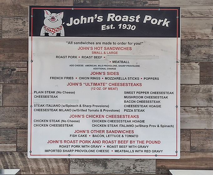 The menu board tells a story of Philadelphia food tradition. Simple offerings, extraordinary results—like a culinary haiku of deliciousness.