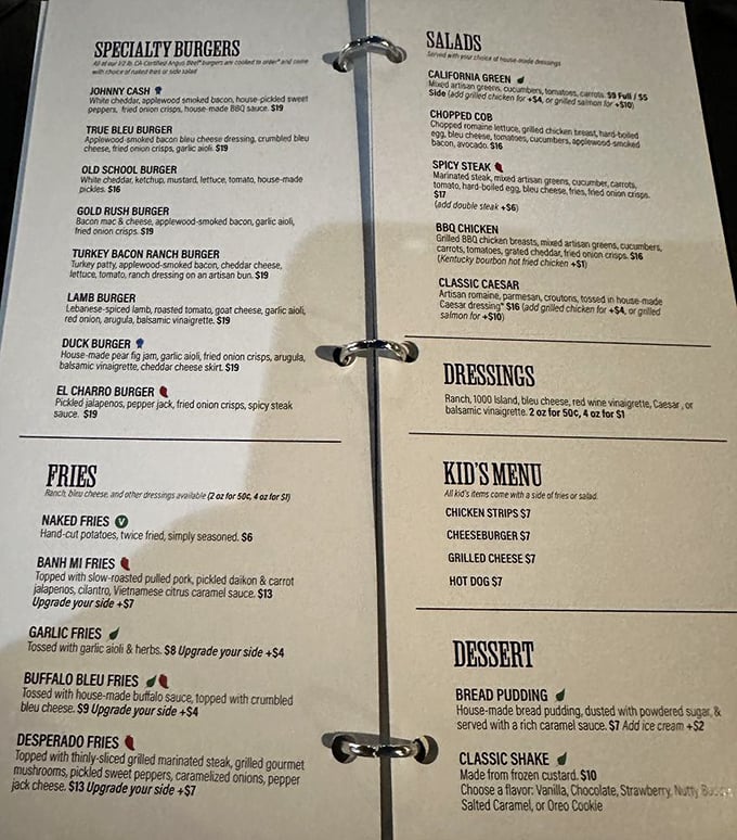 This menu isn't just a list of options—it's a roadmap to flavor country. The Johnny Cash burger? It'll have you singing "Ring of Fire."