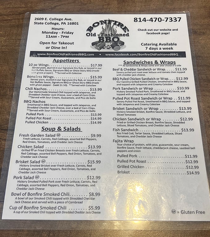 A menu that reads like barbecue poetry—each option promising the kind of flavor that makes you close your eyes and forget your table manners.