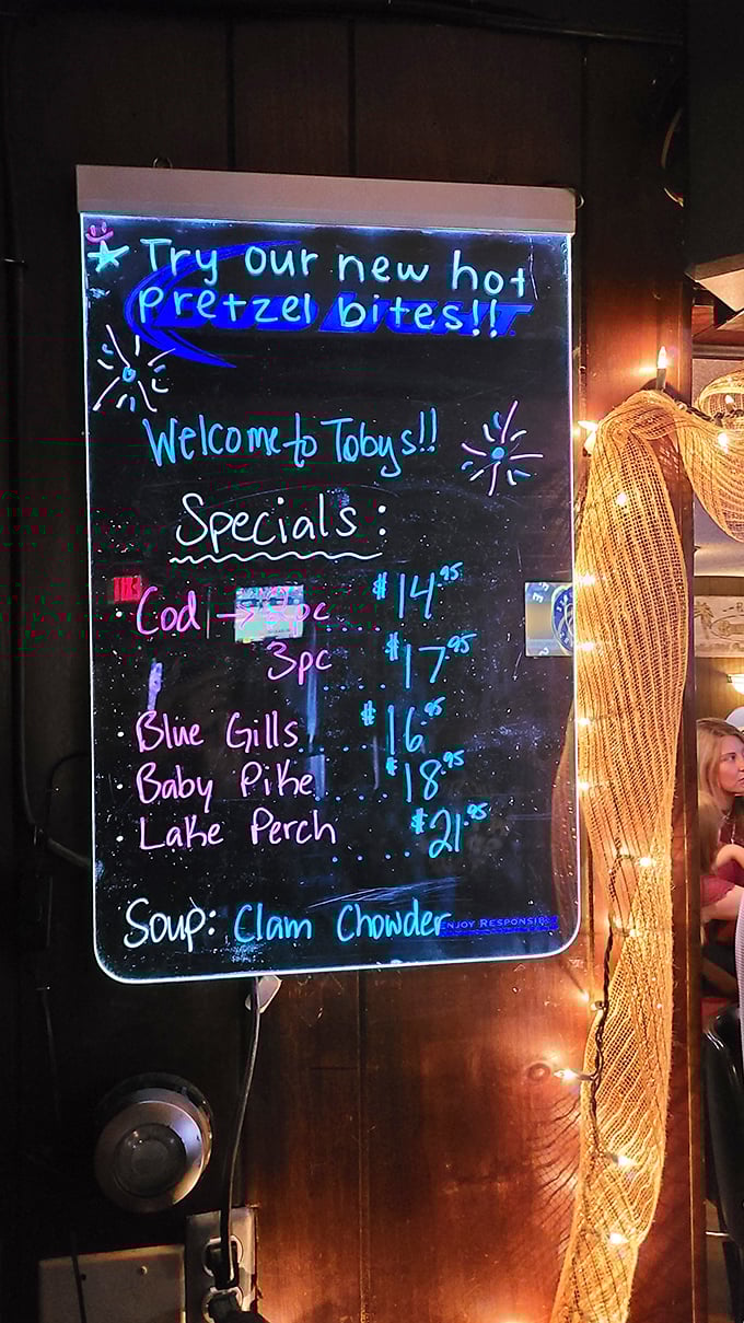 The illuminated specials board at Toby's is Wisconsin's version of fine literature – a glowing testament to the lake-to-plate philosophy that makes Friday nights sacred.