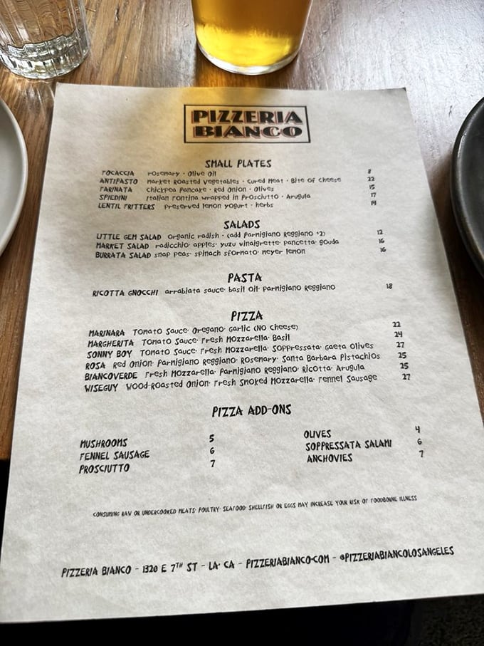 A menu that fits on one page? That's confidence. Each carefully curated offering reads like poetry to hungry eyes.