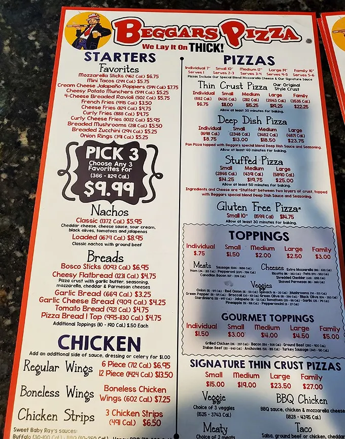 "We Lay It On Thick!" isn't just a catchy slogan—it's the Beggars Pizza promise spelled out on a menu that makes decision-making deliciously difficult.