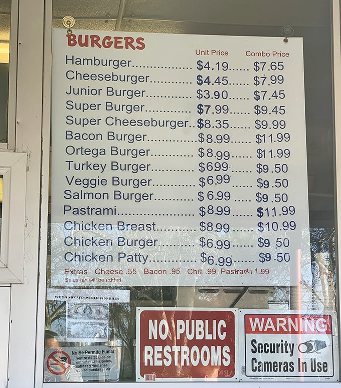 A menu board that tells you everything you need to know about life's priorities: burgers first, everything else second.