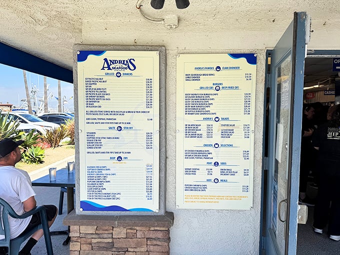 This menu board is like a treasure map where X marks every spot—each item promising oceanic delights worth their weight in gold.