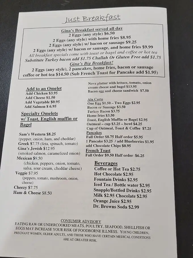 The breakfast menu reads like a love letter to morning classics. Notice Gina's Big Breakfast—the ultimate cure for whatever ailed you last night.