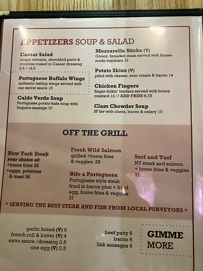 The menu reads like a delicious identity crisis—half American diner classics, half Portuguese specialties. When cultures collide, your taste buds win.