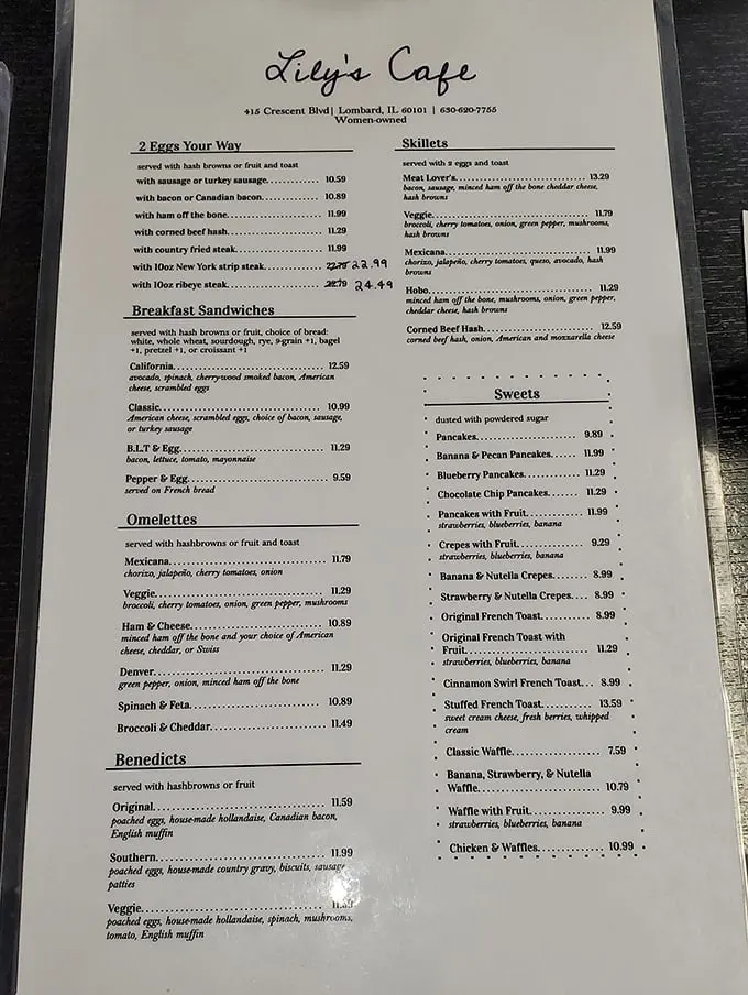 A menu that reads like a love letter to breakfast classics. That "ham off the bone" listing isn't just words—it's a promise of pork perfection.