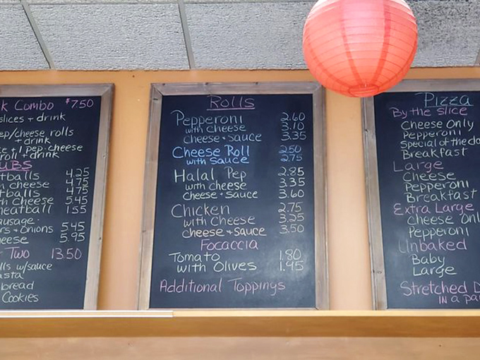 The chalkboard menu – a refreshingly analog experience in our digital world. No QR codes here, just handwritten promises of deliciousness.