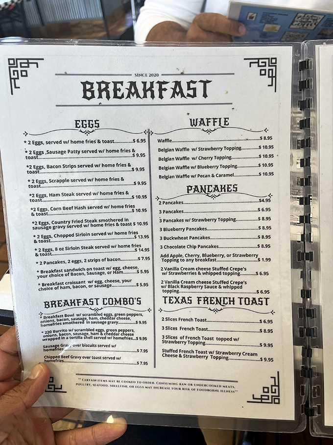 A menu that reads like comfort food poetry – breakfast served all day because pancake cravings know no clock.