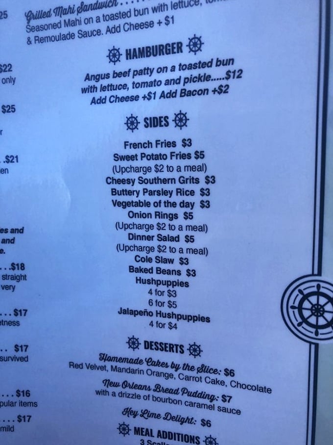 A menu that speaks the universal language of comfort: nautical-themed burgers, Southern sides, and desserts that would make your grandmother both proud and jealous.
