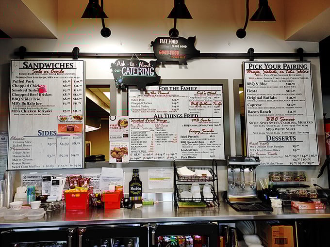 The menu board tells a delicious story—sandwiches, platters, and those legendary wings that have Ohioans mapping routes to Loveland.