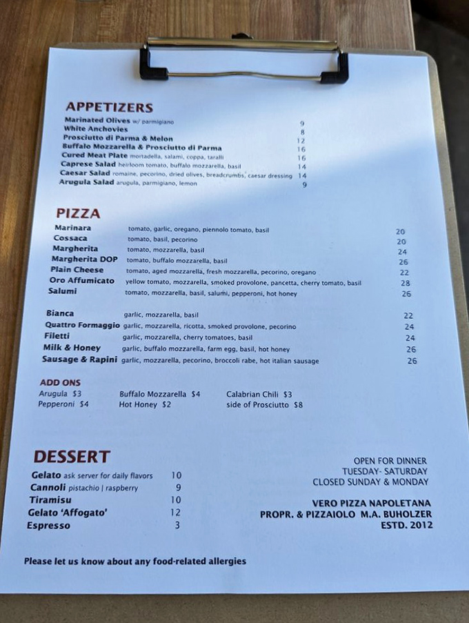 The menu reads like a love letter to Naples—simple, focused, and utterly devoid of pineapple. As it should be.