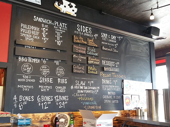 The chalkboard menu speaks the universal language of barbecue devotion—Memphis Dry, Memphis Wet, or Candler Glazed ribs? Life's most delicious dilemmas await.