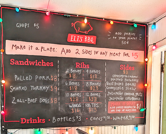 A menu illuminated by festive string lights – simple, straightforward, and promising smoky delights that'll make your cardiologist wince.