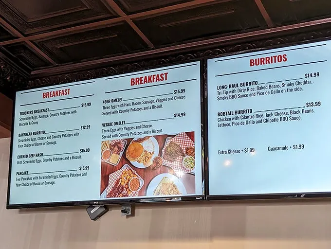 The menu board reads like a love letter to American classics. Breakfast all day? That's not just convenient—that's civilization.