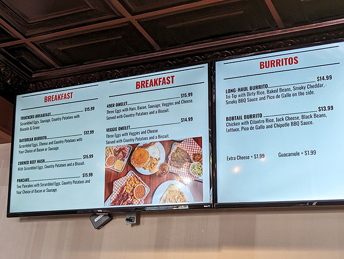 The menu board reads like a love letter to American classics. Breakfast all day? That's not just convenient—that's civilization.