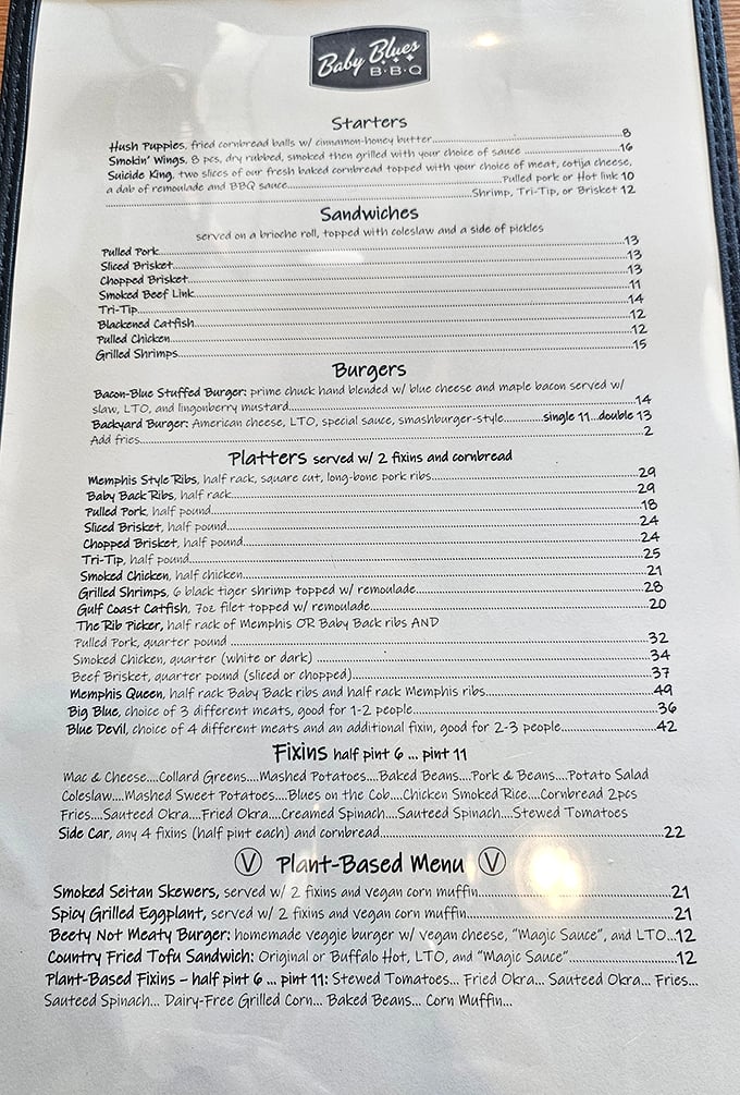 The menu reads like barbecue poetry – Memphis ribs, pulled pork, and tri-tip sharing space with plant-based options for the enlightened carnivore.