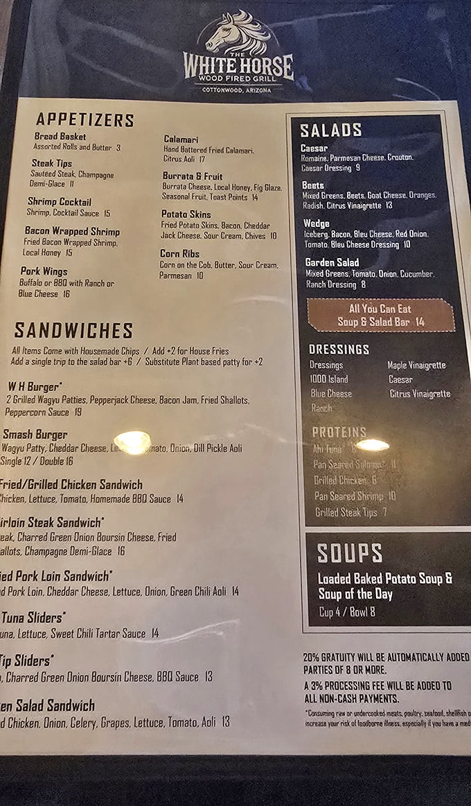 The menu reads like a love letter to comfort food—elevated with touches like bacon jam, local honey, and champagne demi-glace that make your taste buds tango.