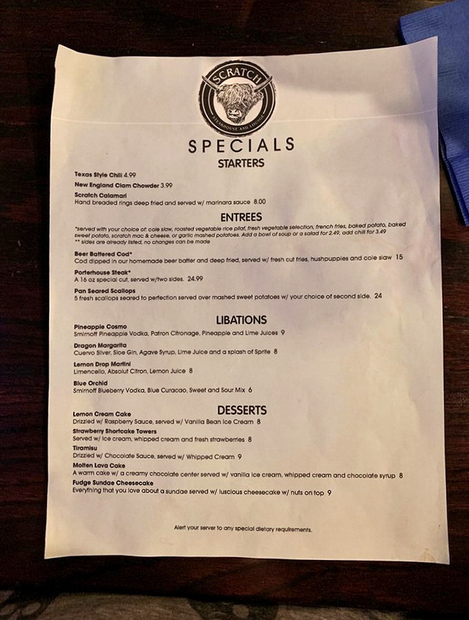 A menu that doesn't need fancy fonts or pretentious descriptions—just honest food done right. The Highland cattle logo says it all: robust flavor ahead.