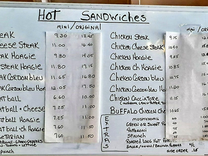The handwritten menu board tells you everything you need to know – this place prioritizes feeding you well over fancy typography.