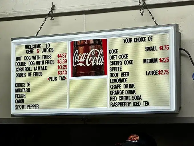 The menu board at Gene & Jude's is a masterclass in simplicity. Four food items, some drinks, and absolutely zero pretension.