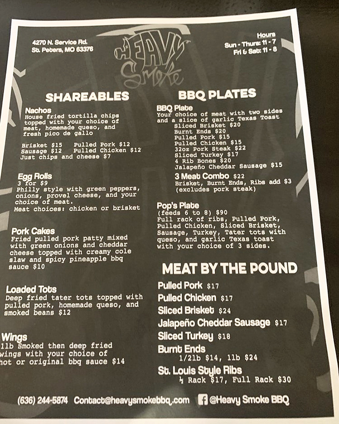 A menu that reads like barbecue poetry—shareables, plates, and meat by the pound. Notice there's no salad section? That's how you know it's the real deal.