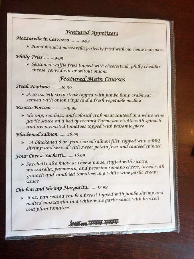 The menu reads like a love letter to Italian-American classics, with each description making your stomach growl louder than a passing freight train.
