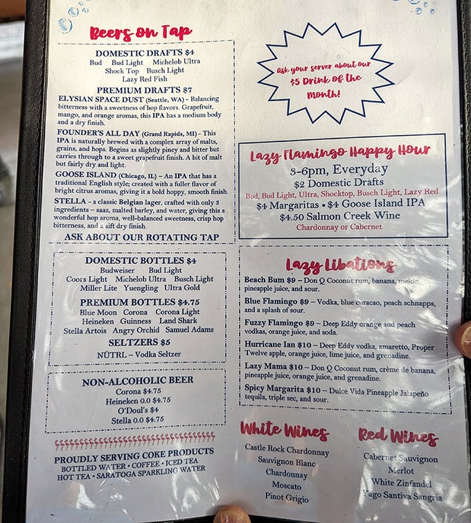 The drink menu reads like a love letter to vacation mode—Beach Bum, Blue Flamingo, and Hurricane Ian await your thirsty approval.