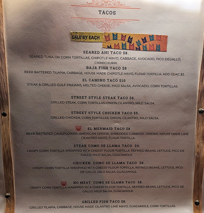 The taco menu reads like poetry for hungry souls – from seared ahi to beer-battered cauliflower, everyone's invited to this flavor party.