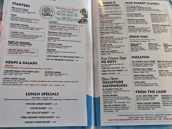 A menu that reads like a love letter to the Gulf—where "Famous Grouper Sandwich" isn't marketing speak, it's a local promise.