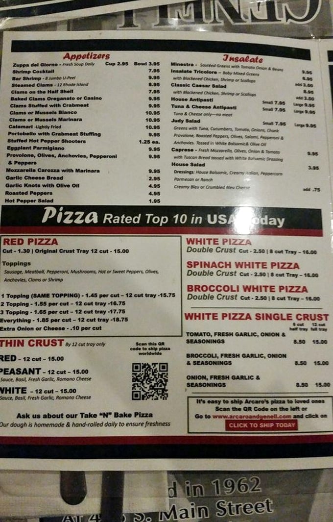 A menu that reads like an Italian grandmother's greatest hits album. The "Pizza Rated Top 10 in USA Today" isn't just bragging—it's a promise they deliver on.