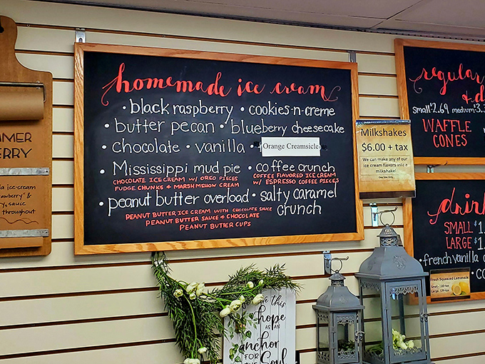 This chalkboard menu isn't just listing ice cream flavors—it's offering life choices. Peanut Butter Overload might be the wisest decision you'll make all year.